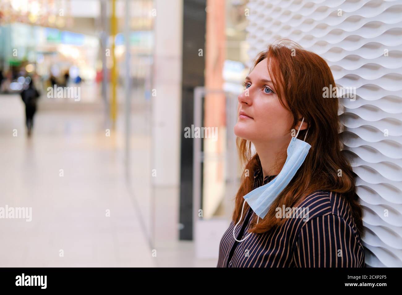 Woman medical mask removed hi-res stock photography and images - Alamy
