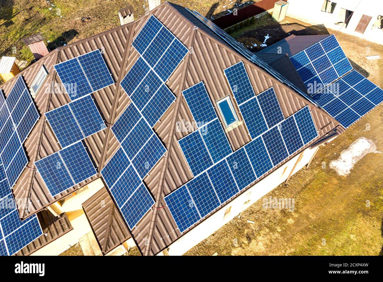 Aerial top view of new modern residential house cottage with blue shiny ...