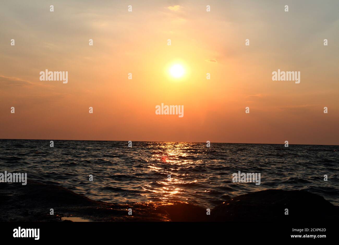 gold sea sunset landscape panorama, background natural Stock Photo - Alamy
