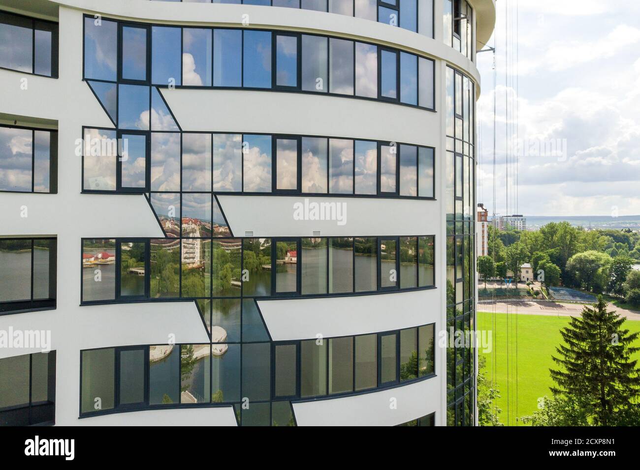 Many windows on new apartment building facade Stock Photo - Alamy