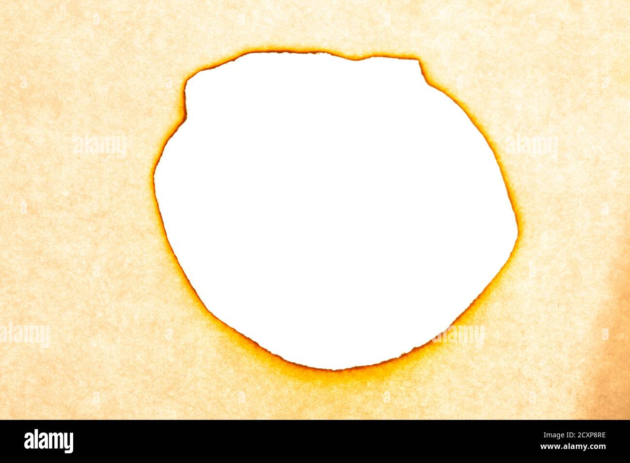 old burnt paper. round hole in the middle. background for design Stock ...