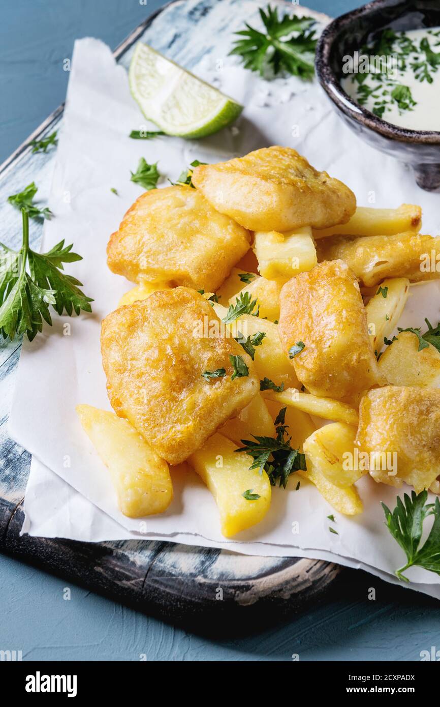 Traditional british fast food fish and chips. Served with white cheese ...
