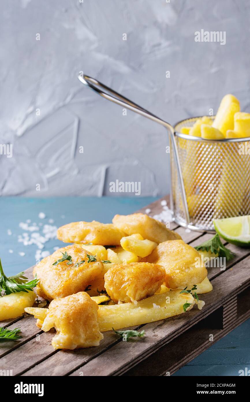 Traditional british fast food fish and chips. Served with white cheese ...