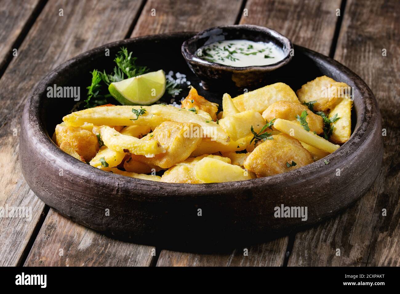 Traditional british fast food fish and chips. Served with white cheese ...