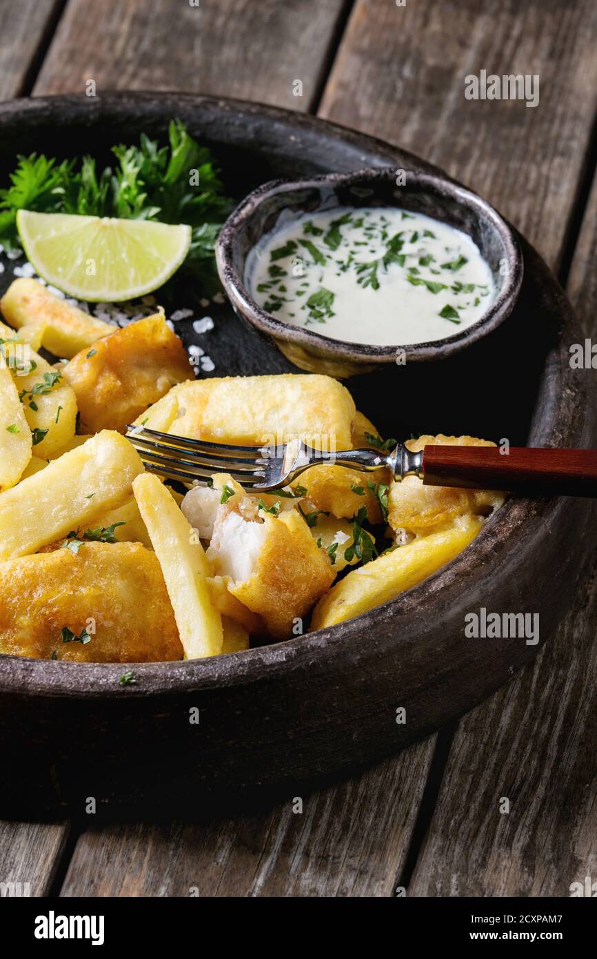 Traditional british fast food fish and chips. Served with white cheese ...