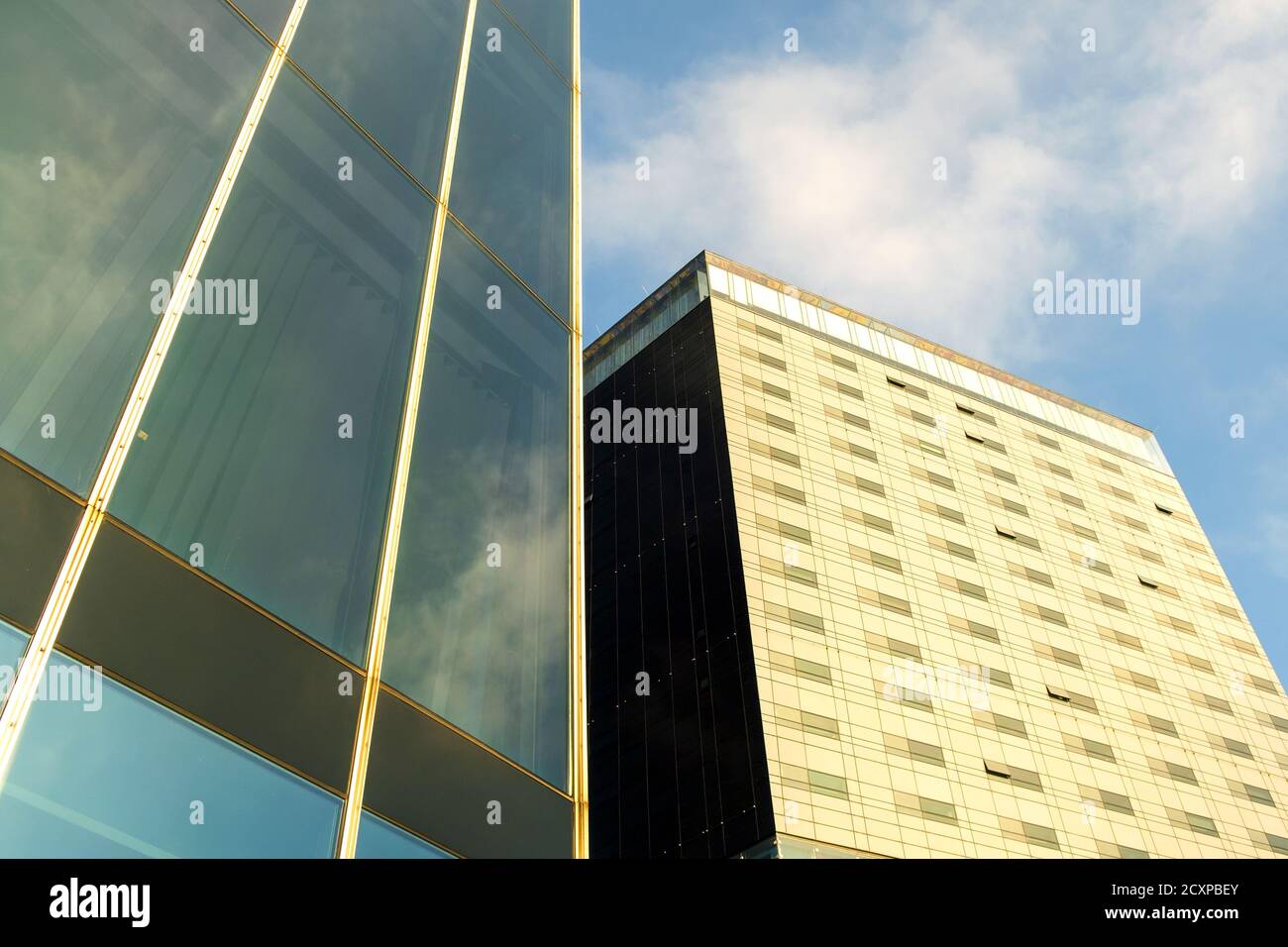 Perspective view of modern high-rise glass skyscraper building Stock ...