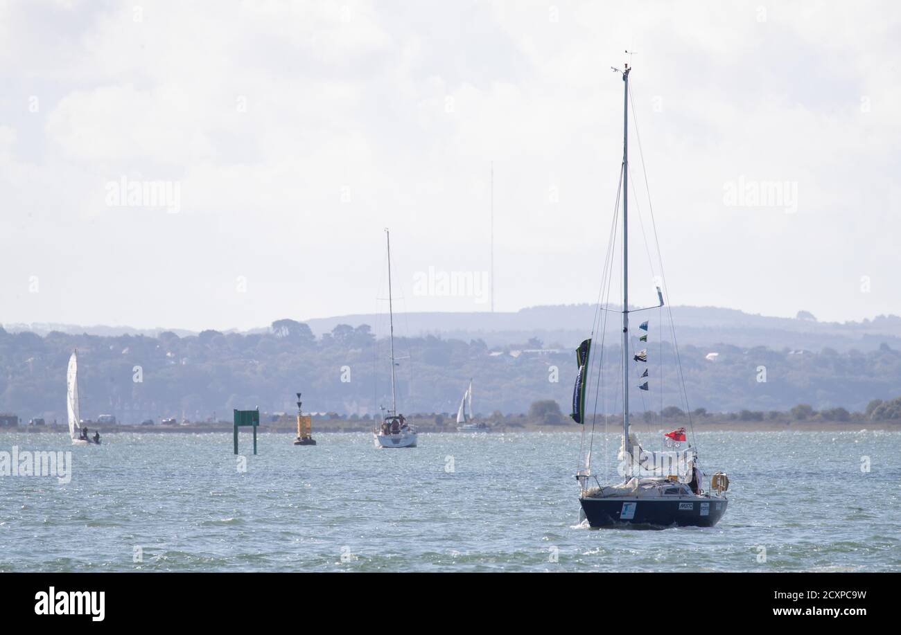 15-year-old Timothy Long sails his 28ft boat 'Alchemy' into Hamble ...