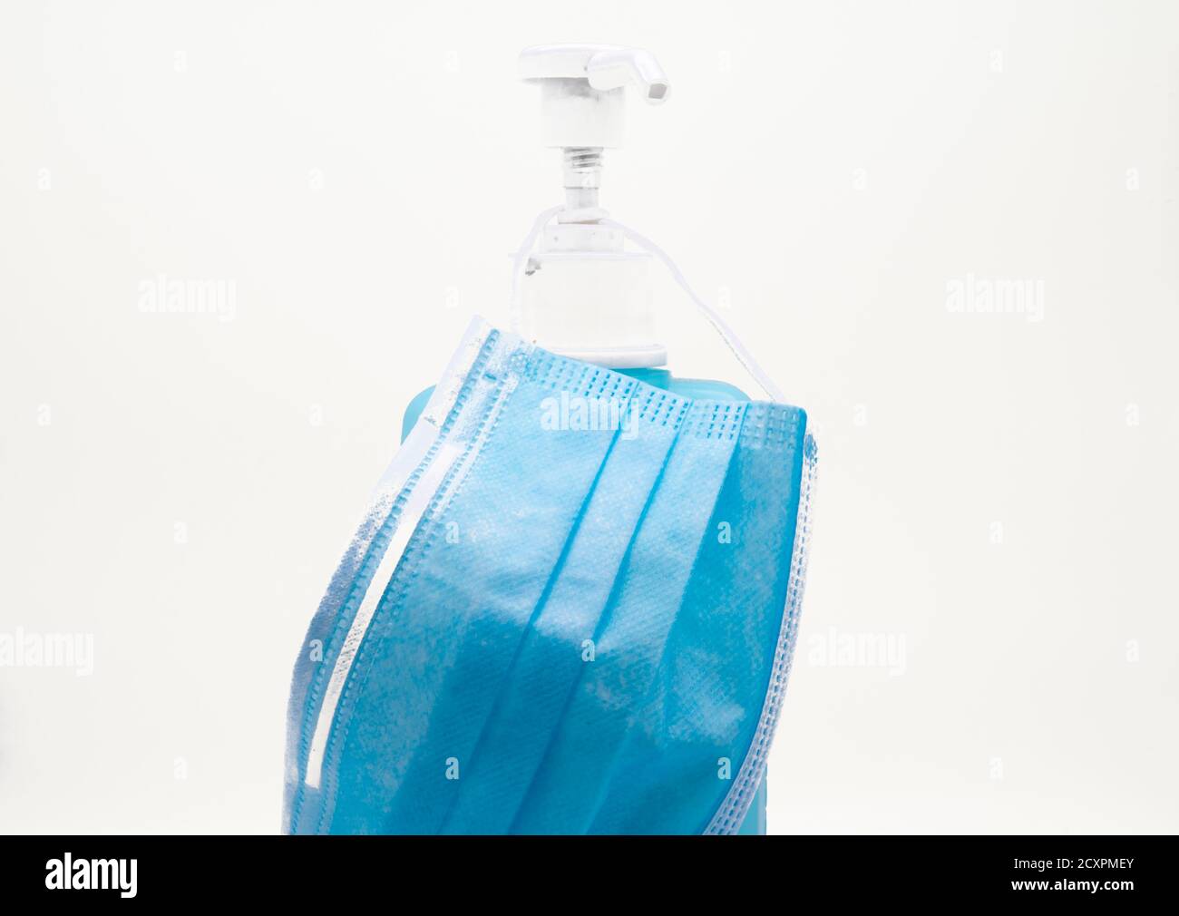 Virus protection mask and disinfectant isolated Stock Photo - Alamy