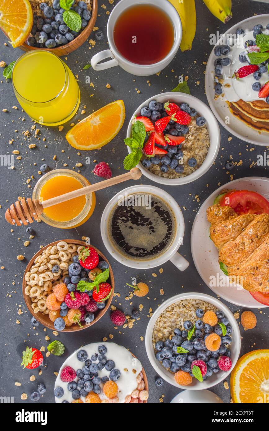 Various breakfast food concept. Traditional healthy breakfast foods and ...