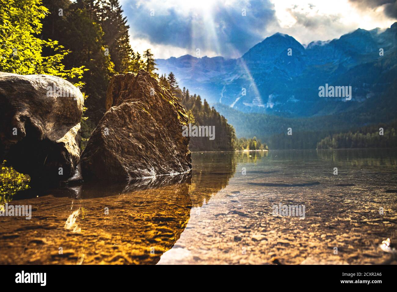 Little paradise at lake tovel with a cloudy sky Stock Photo - Alamy