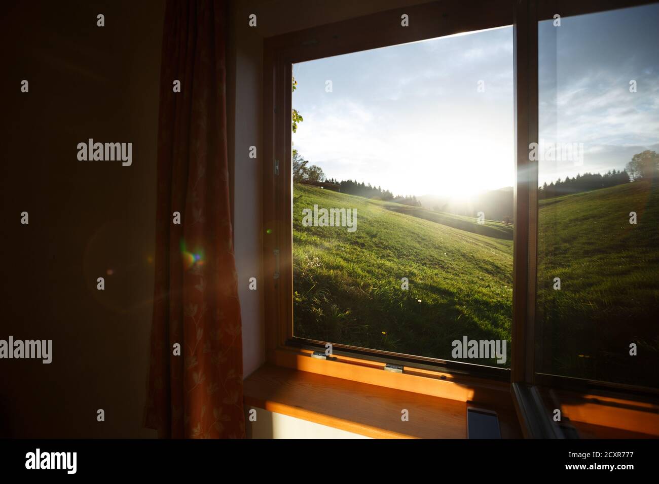 morning in the mountains. beautiful view from the window at dawn in the ...