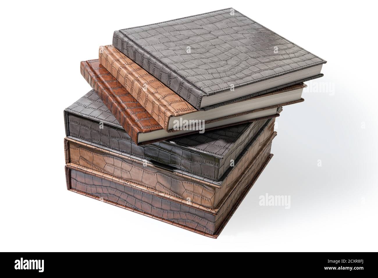 different sizes albums and books on a white background Stock Photo - Alamy