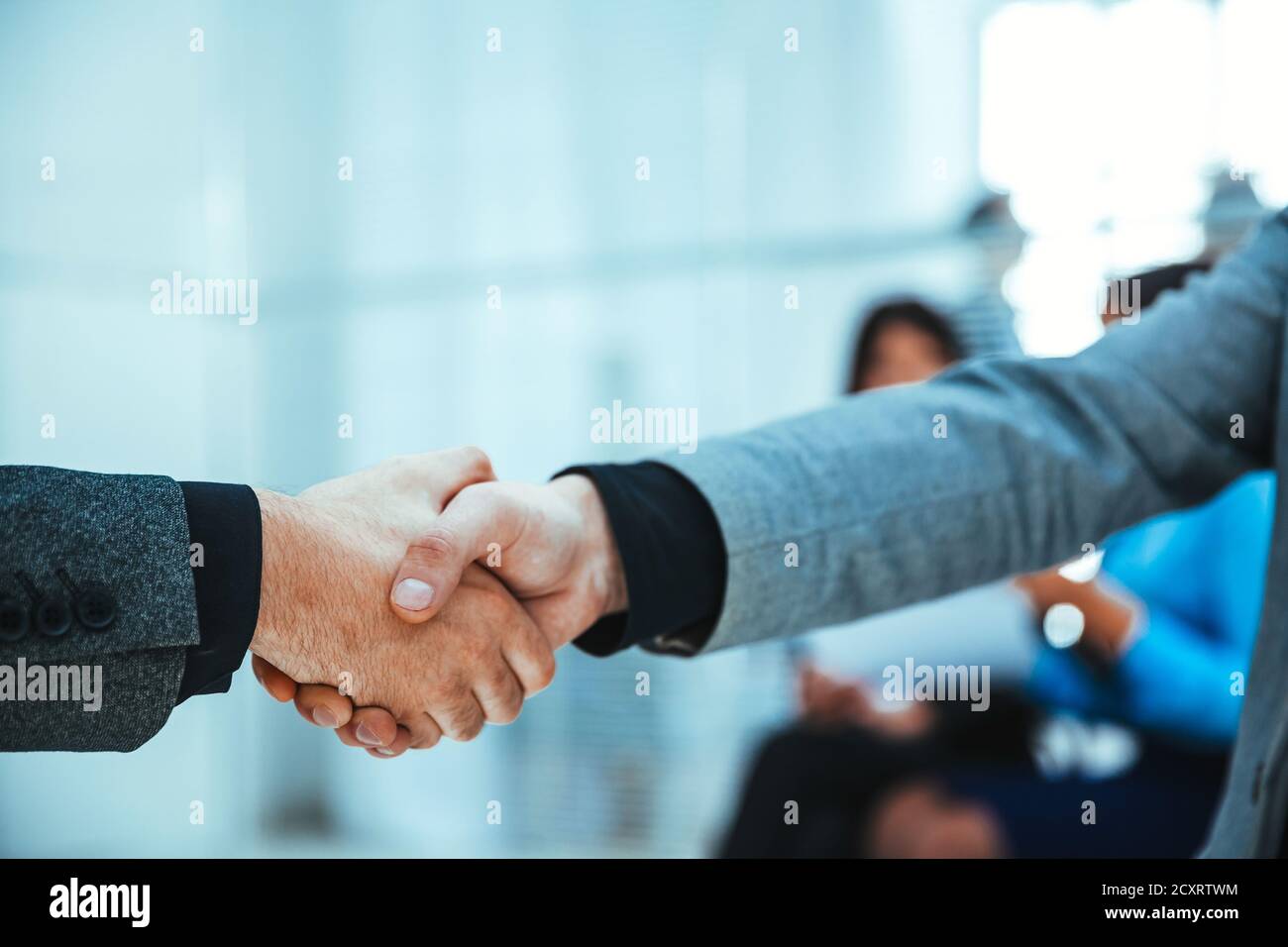 close up. business handshake on an office background Stock Photo - Alamy