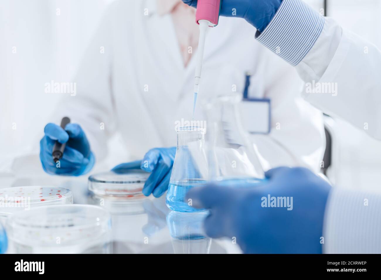 close up. group of scientists microbiologists working in the laboratory ...