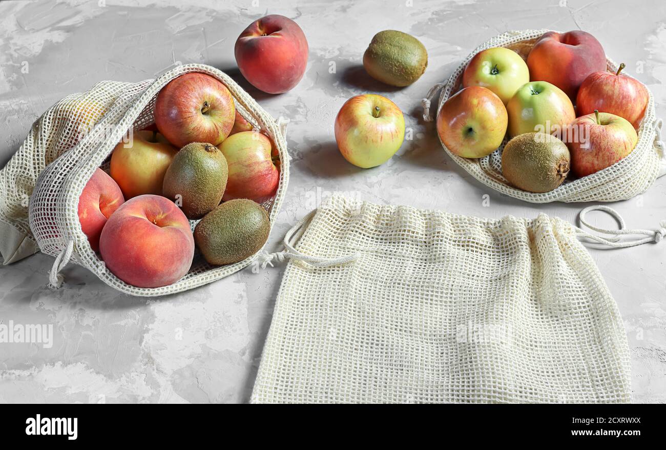 Zero waste concept: fresh market fruits - peaches, apples, kiwi in ...