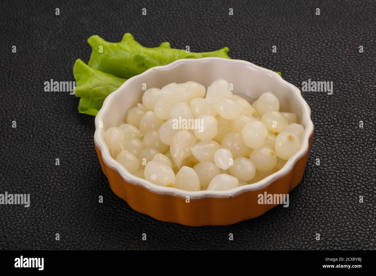 Pickled baby onion in the bowl Stock Photo - Alamy