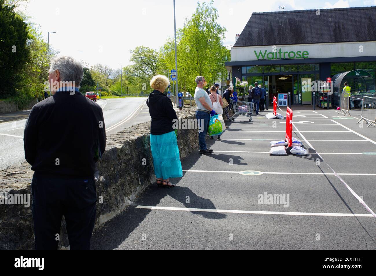 Shoppers outside Waitrose, Menai Bridge store Stock Photo - Alamy