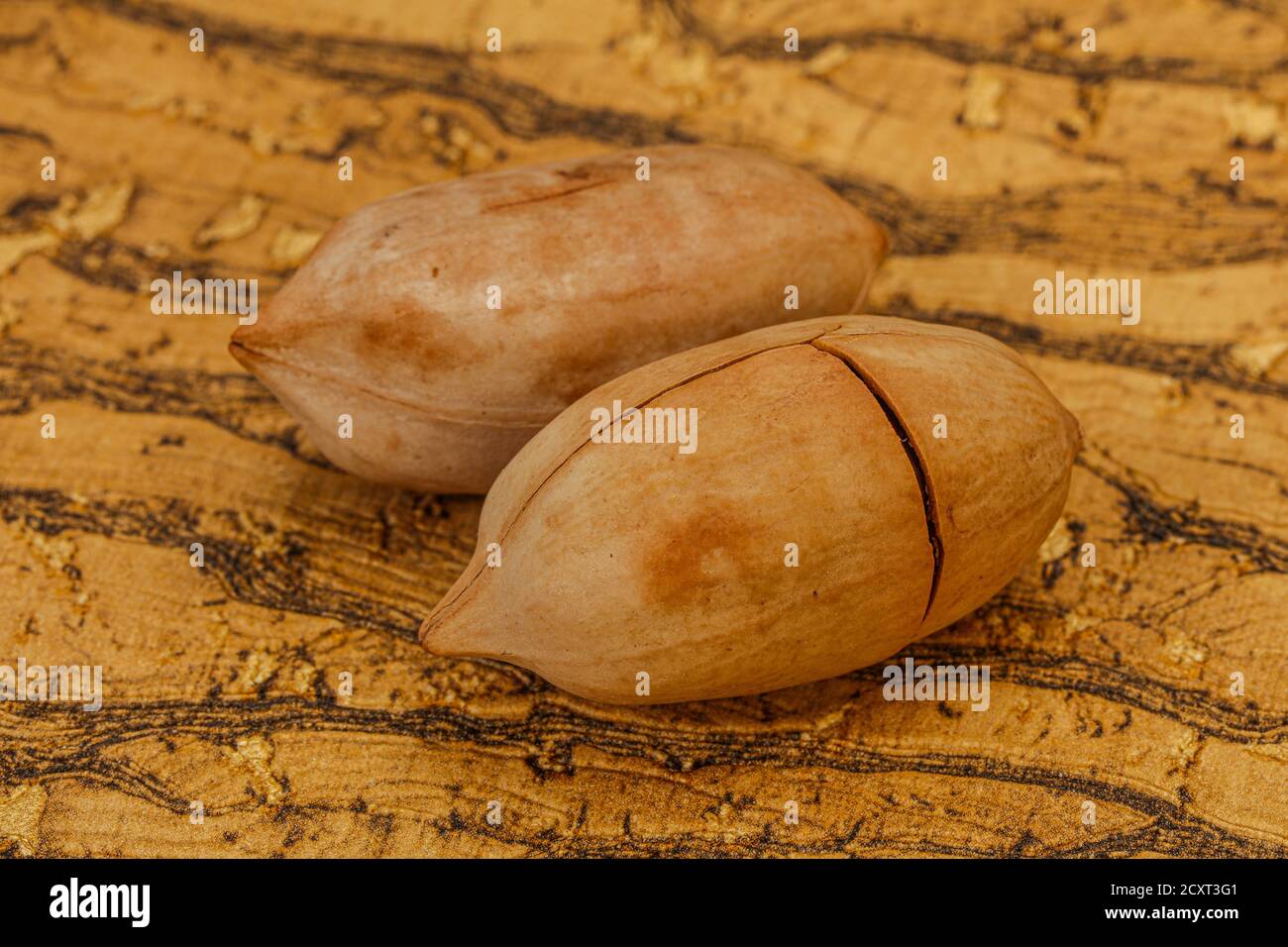 Ripe tasty Two whole pecan nuts Stock Photo - Alamy