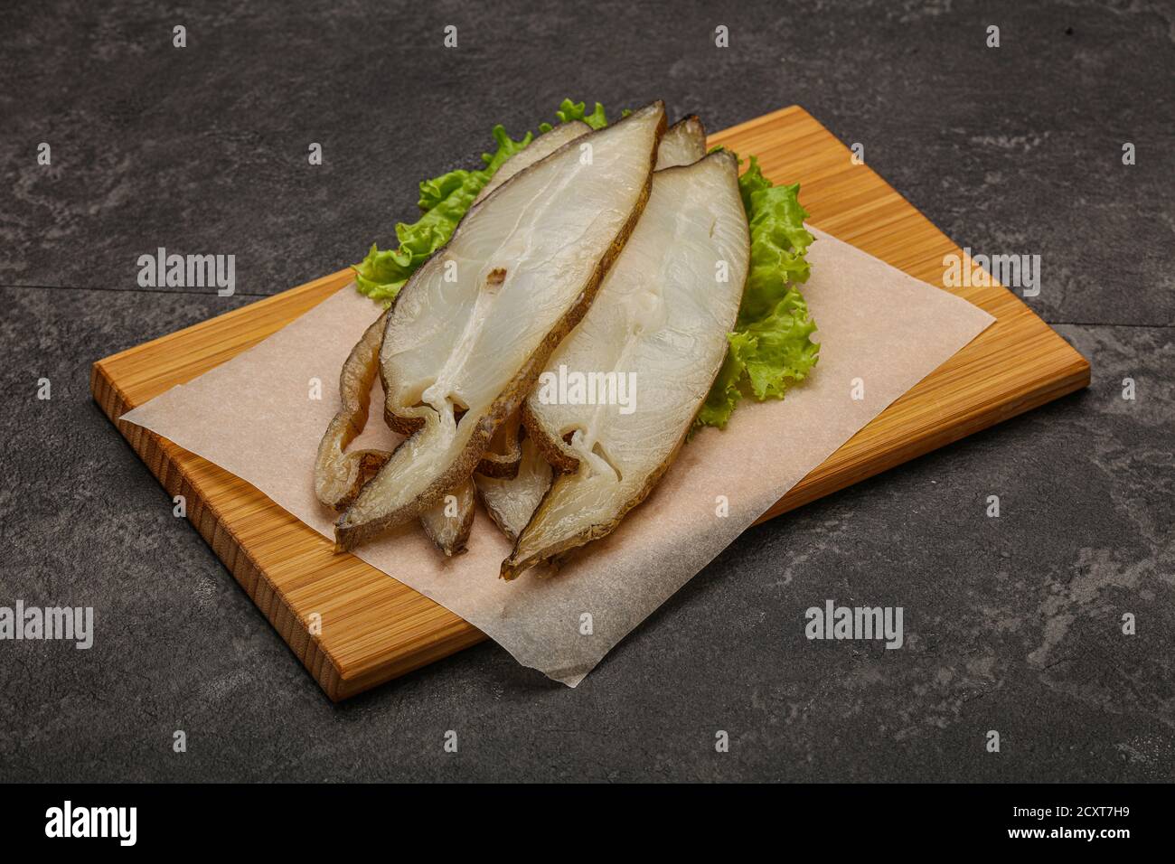 Delicous smoked halibut fish slices snack Stock Photo - Alamy