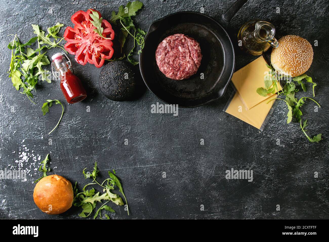Ingredients for cooking hamburger. Meat beef burger in pan, cheese ...