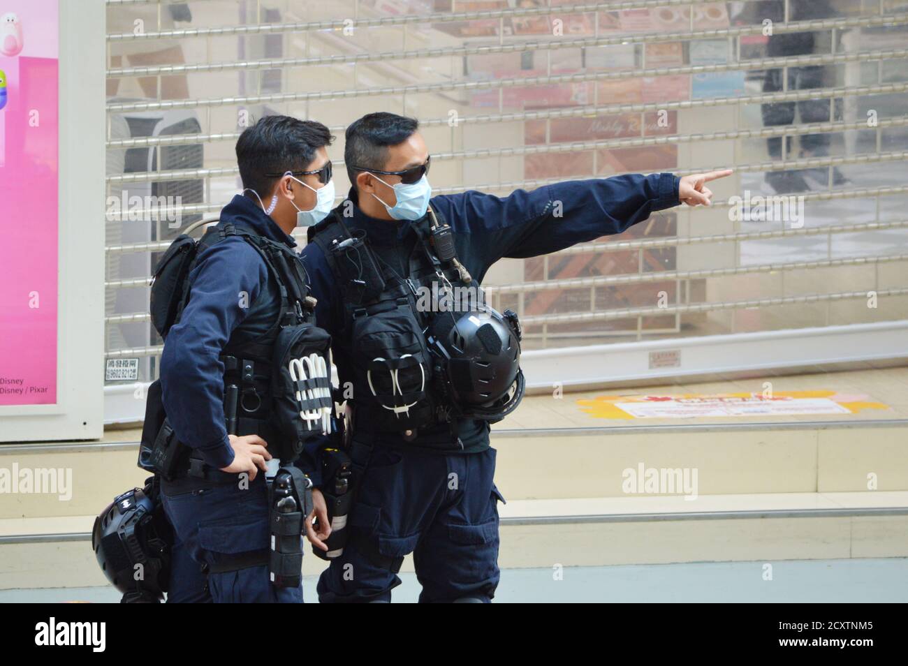 Hong Kong Police Force officers in Causeway Bay shopping district on ...