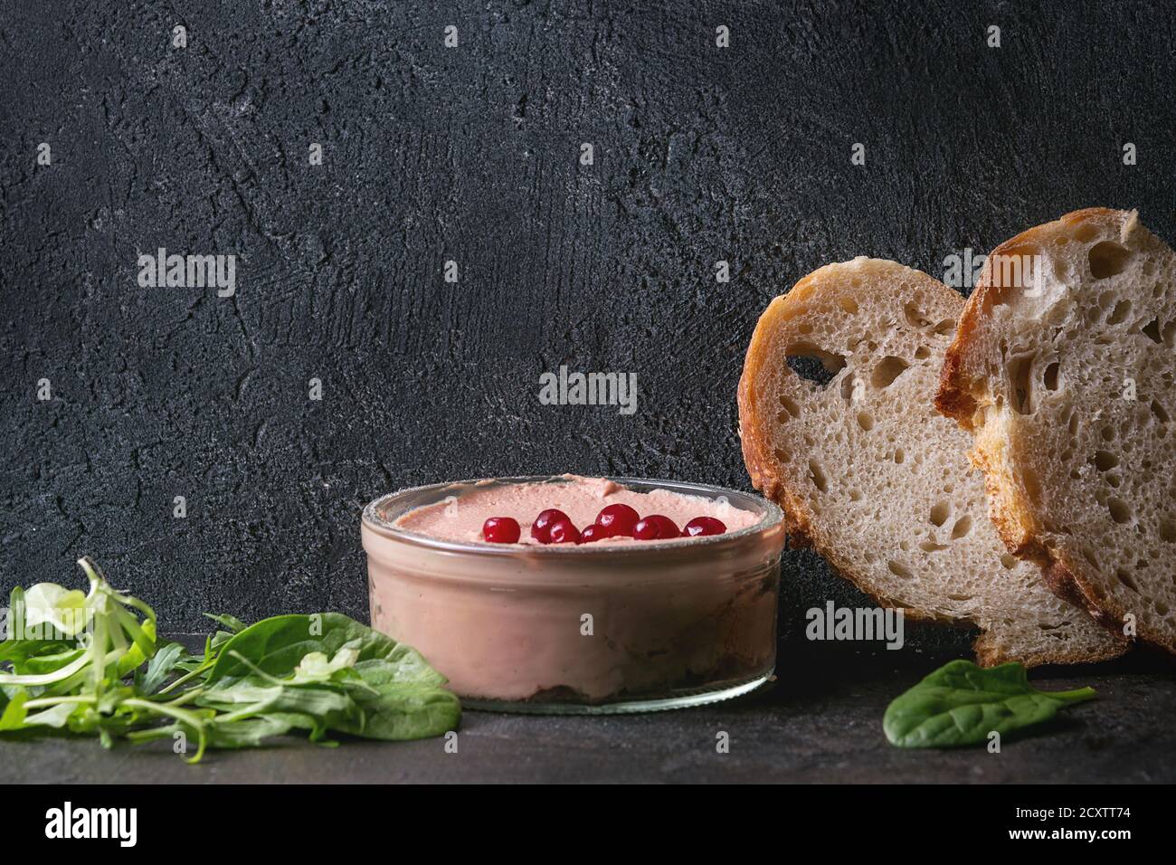 Chicken homemade liver paste or pate with sliced whole grain bread ...