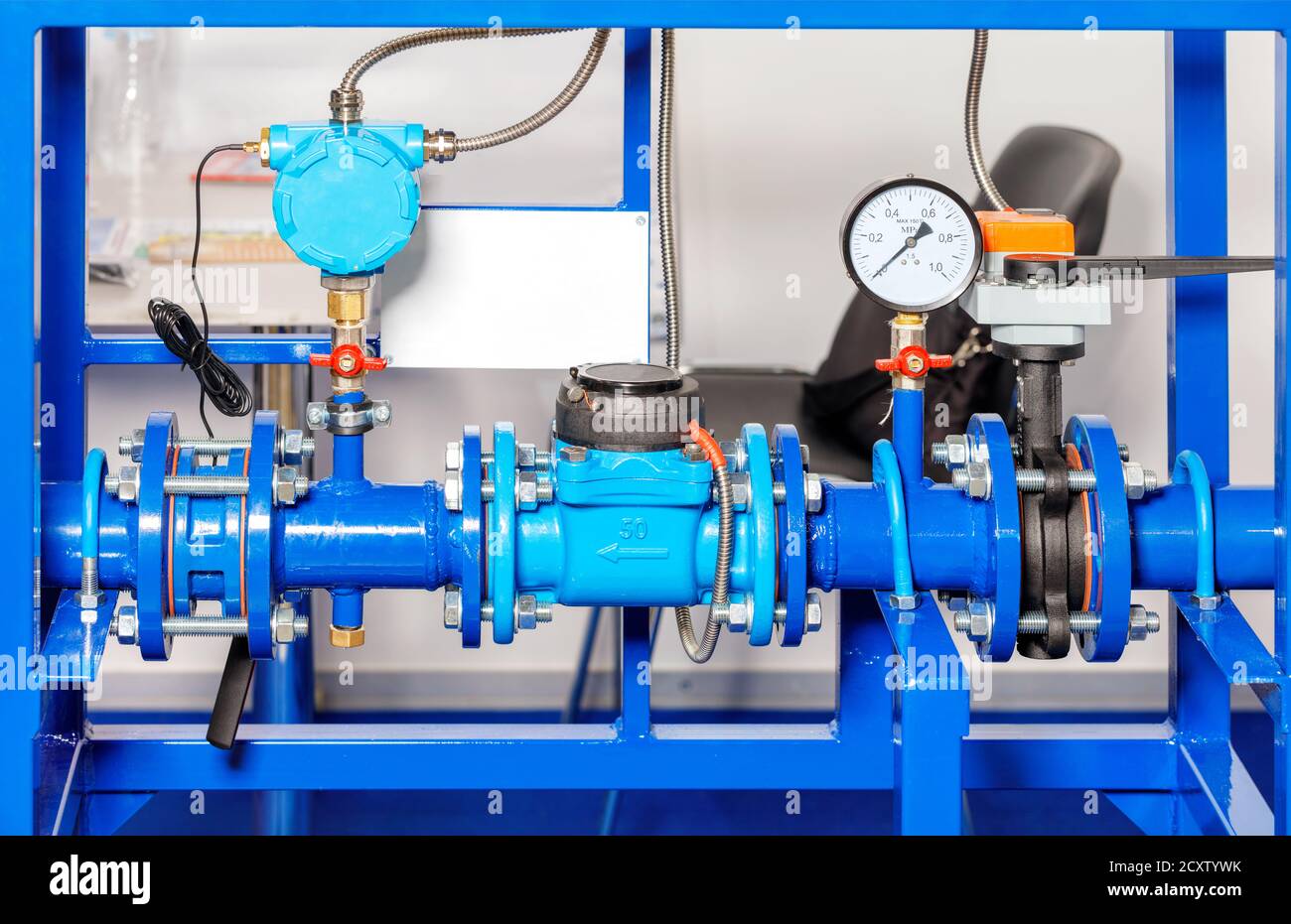 Installation of the water metering and pressure system assembly, close ...