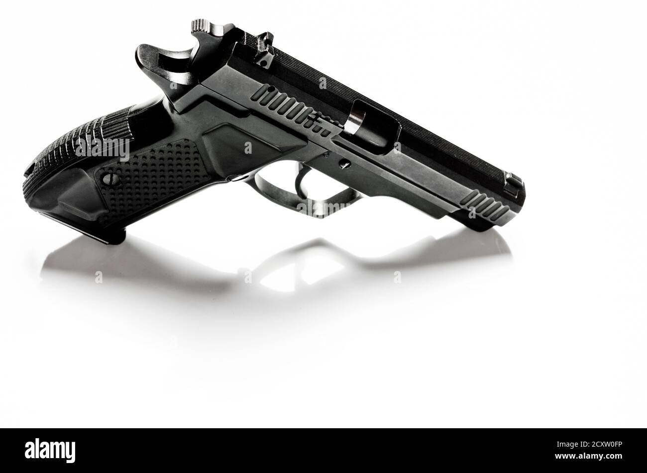 The legalization of weapons. Black traumatic gun on a white background ...