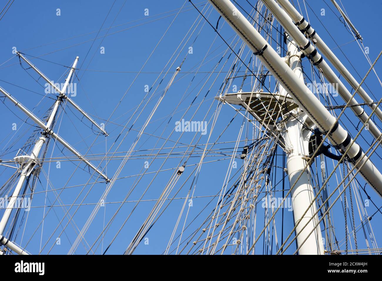 Ropes and masts with lookout maritime symbol Stock Photo - Alamy