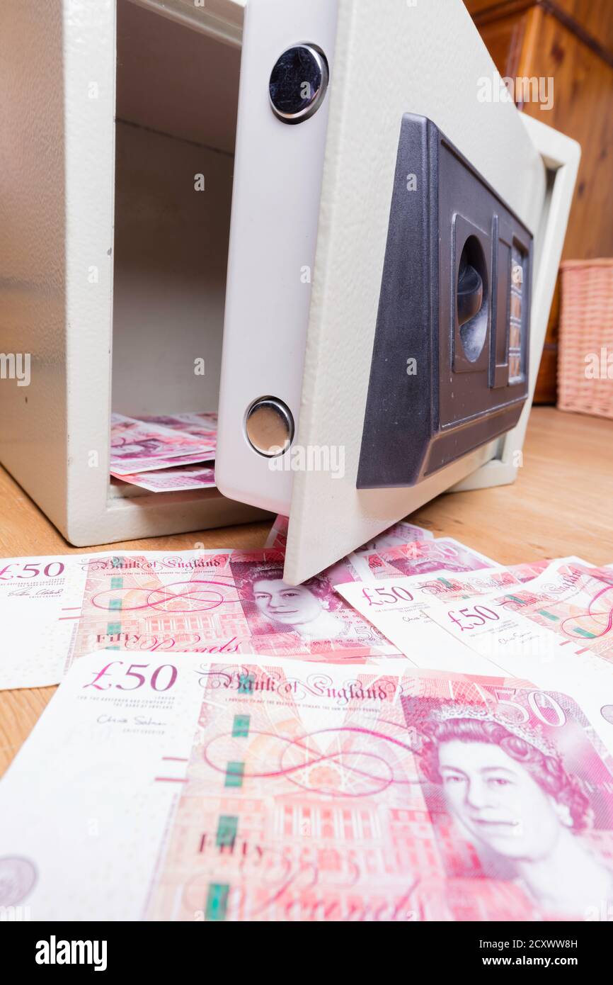 Overflowing money sterling hi-res stock photography and images - Alamy