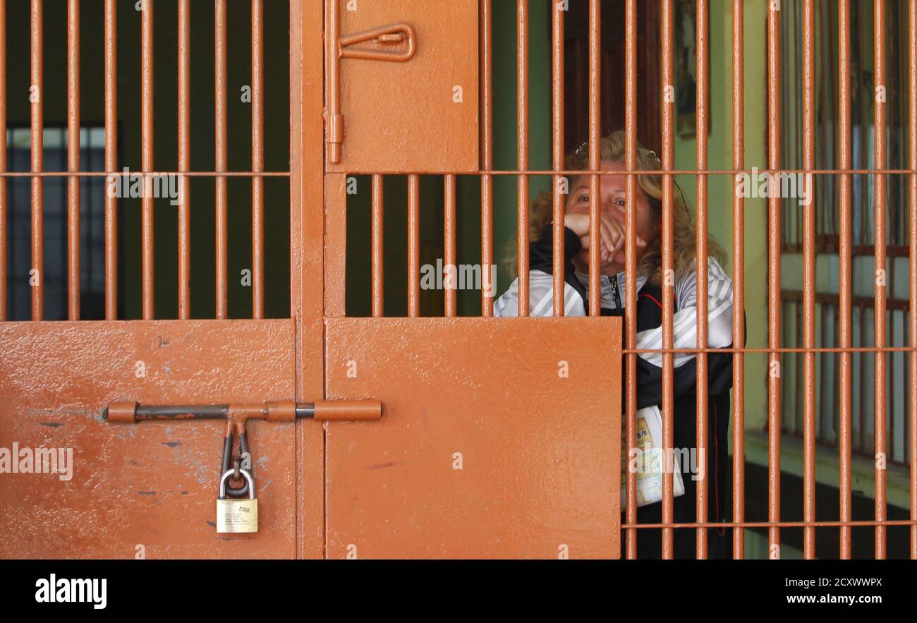 Female prison inmate in cell hi-res stock photography and images - Alamy