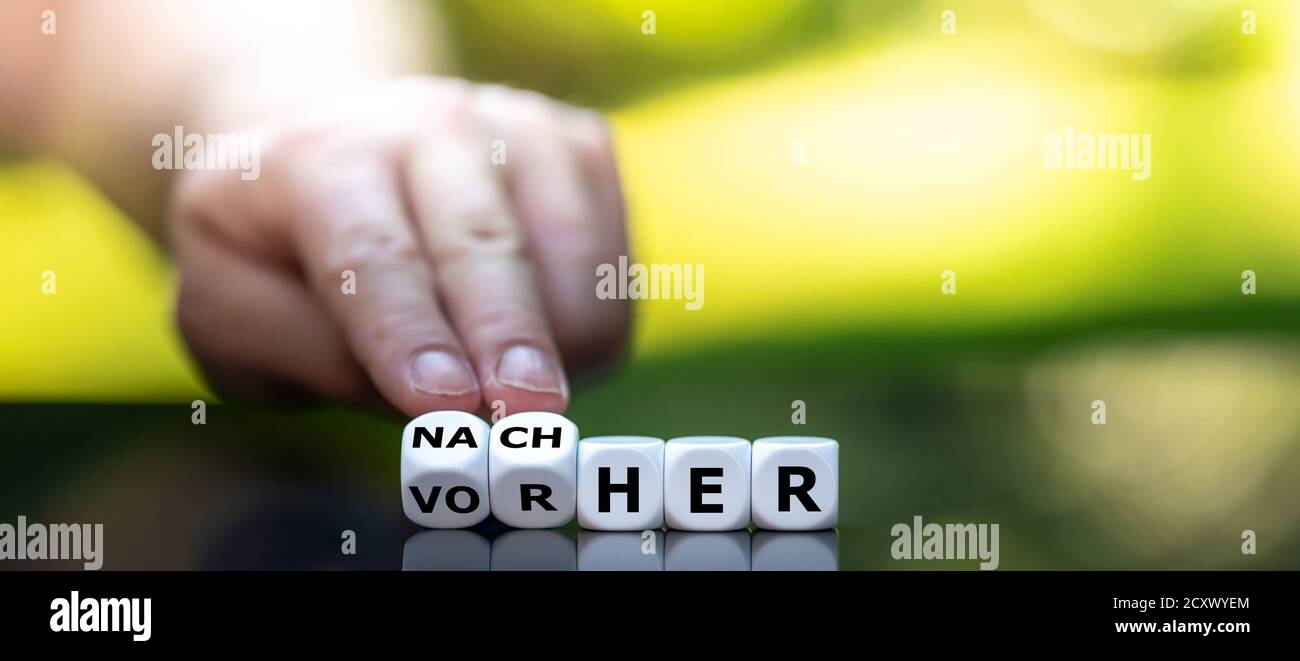 Hand turns dice and changes the German word "vorher" (before) to ...