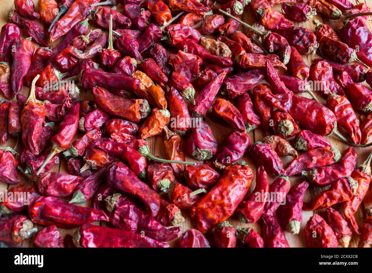 Dried red Cayenne peppers- food background Stock Photo - Alamy