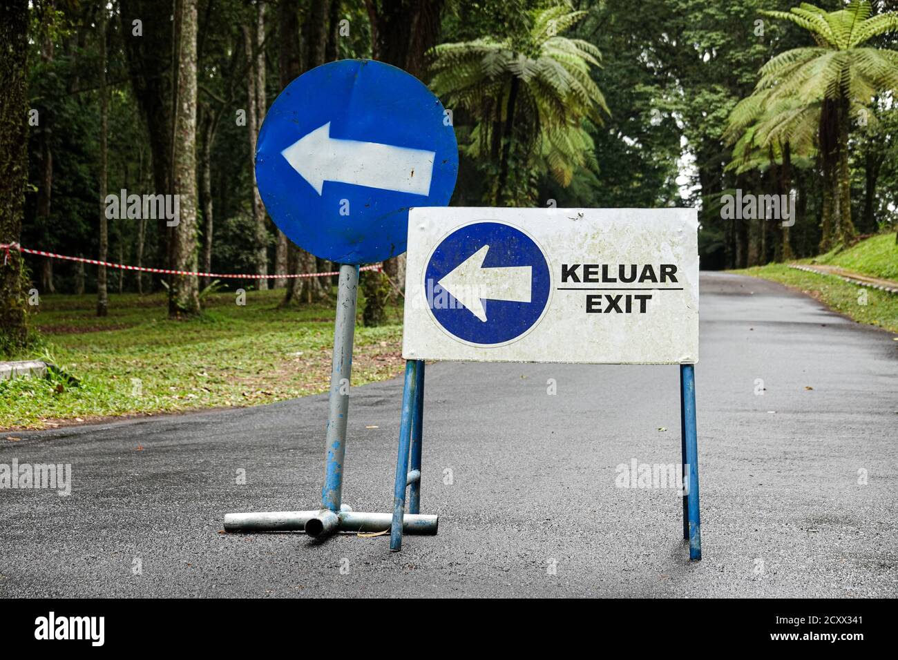 Sign toilet, stair and exit direction, blue text and red arrow on white ...