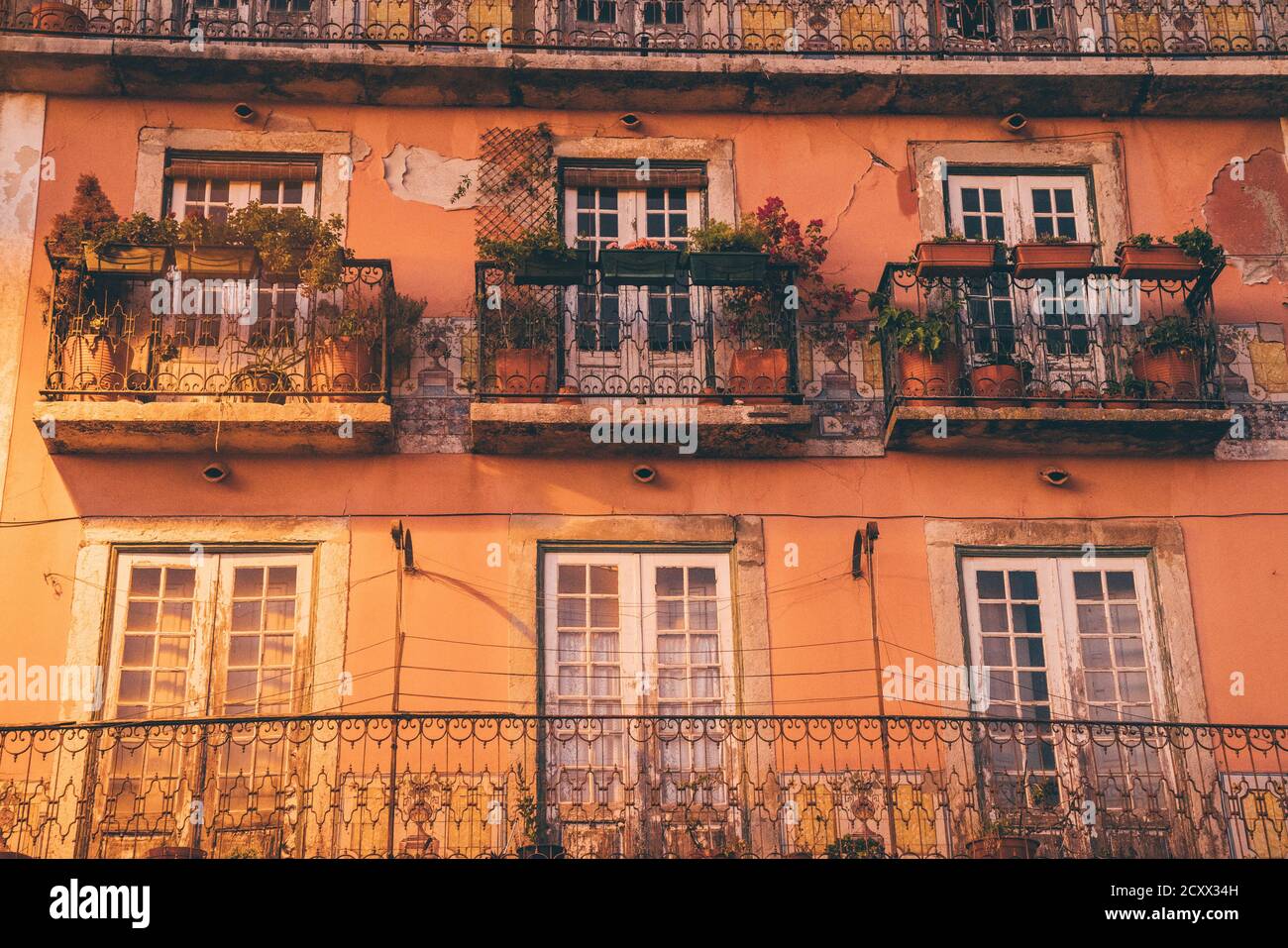 Closeup of a residential building with old-fashioned windows and ...