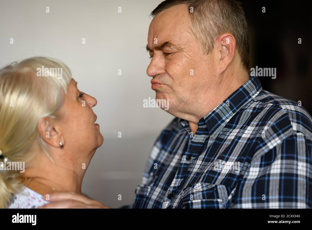 Seniors couple portrait on at home Stock Photo - Alamy
