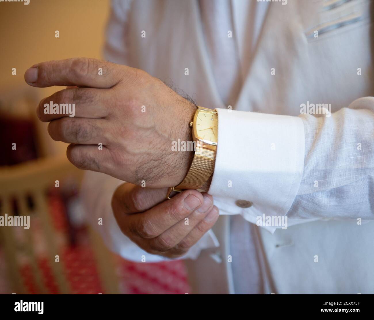 Gold Watch, Fixing High Resolution Stock Photography and Images - Alamy