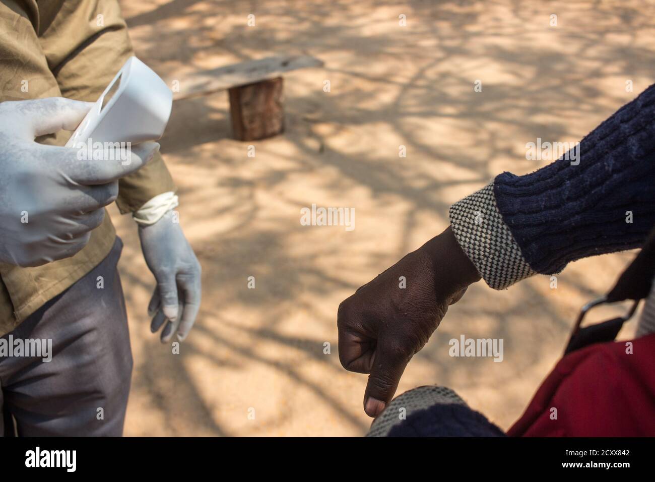 Thermometer being used to detect signs of coronavirus by measuring the ...