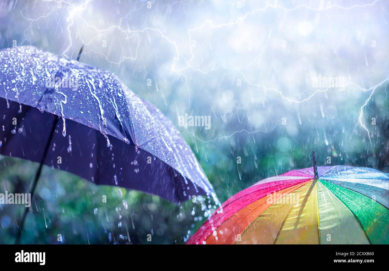 Abstract Weather Concept - Rain And Lightning On Umbrellas With ...