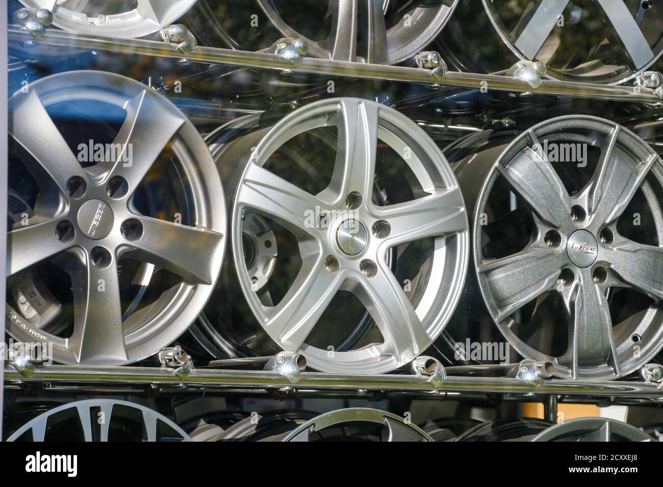 Russia Vyborg. 09.09.2020 Car rims in the shop window behind the glass ...