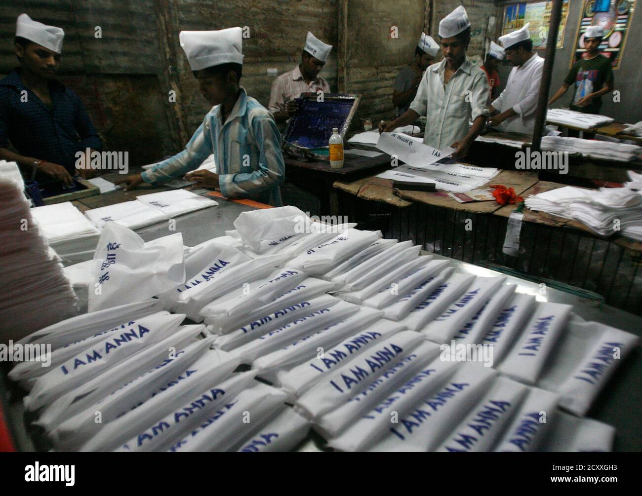 Man with a gandhi cap hi-res stock photography and images - Alamy