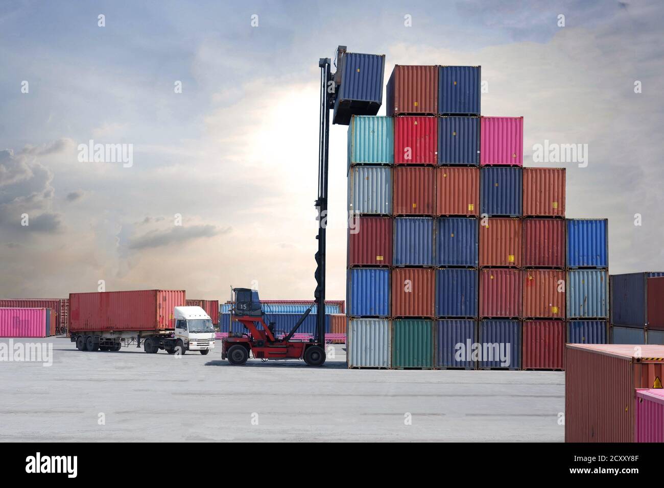 Inland shipping of containers with a container handler Stock Photo - Alamy