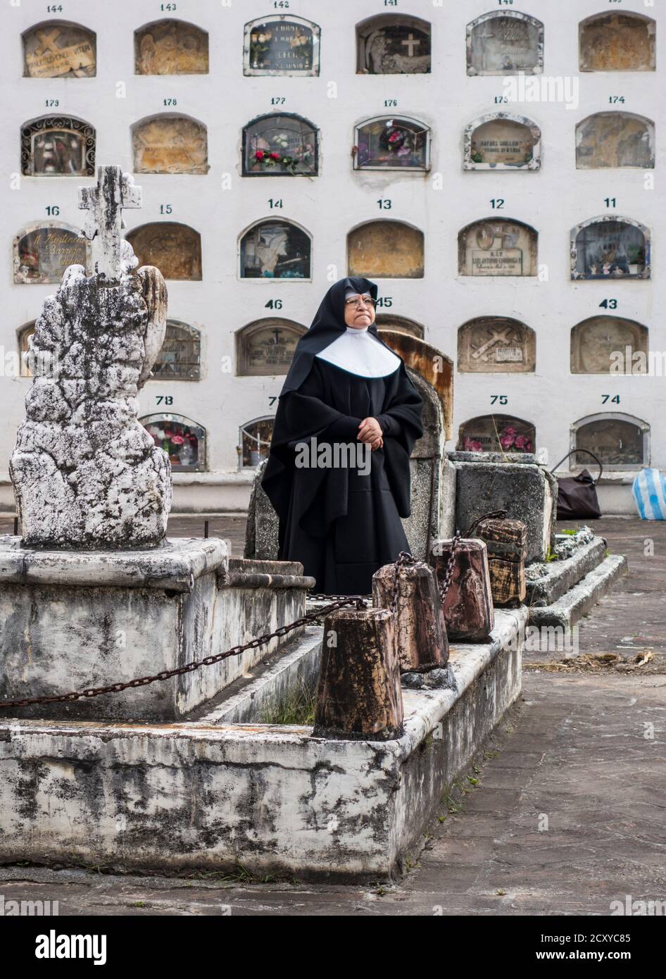 Cuenca, Ecuador - November 1, 2015 -a Catholic nun stands in front of ...