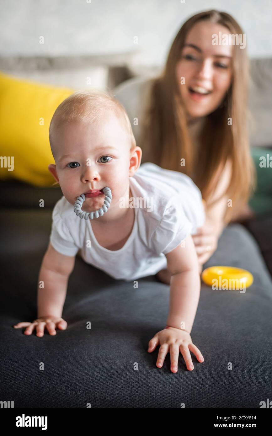 Mother and kid play and have fun at home. Really happy family Stock ...