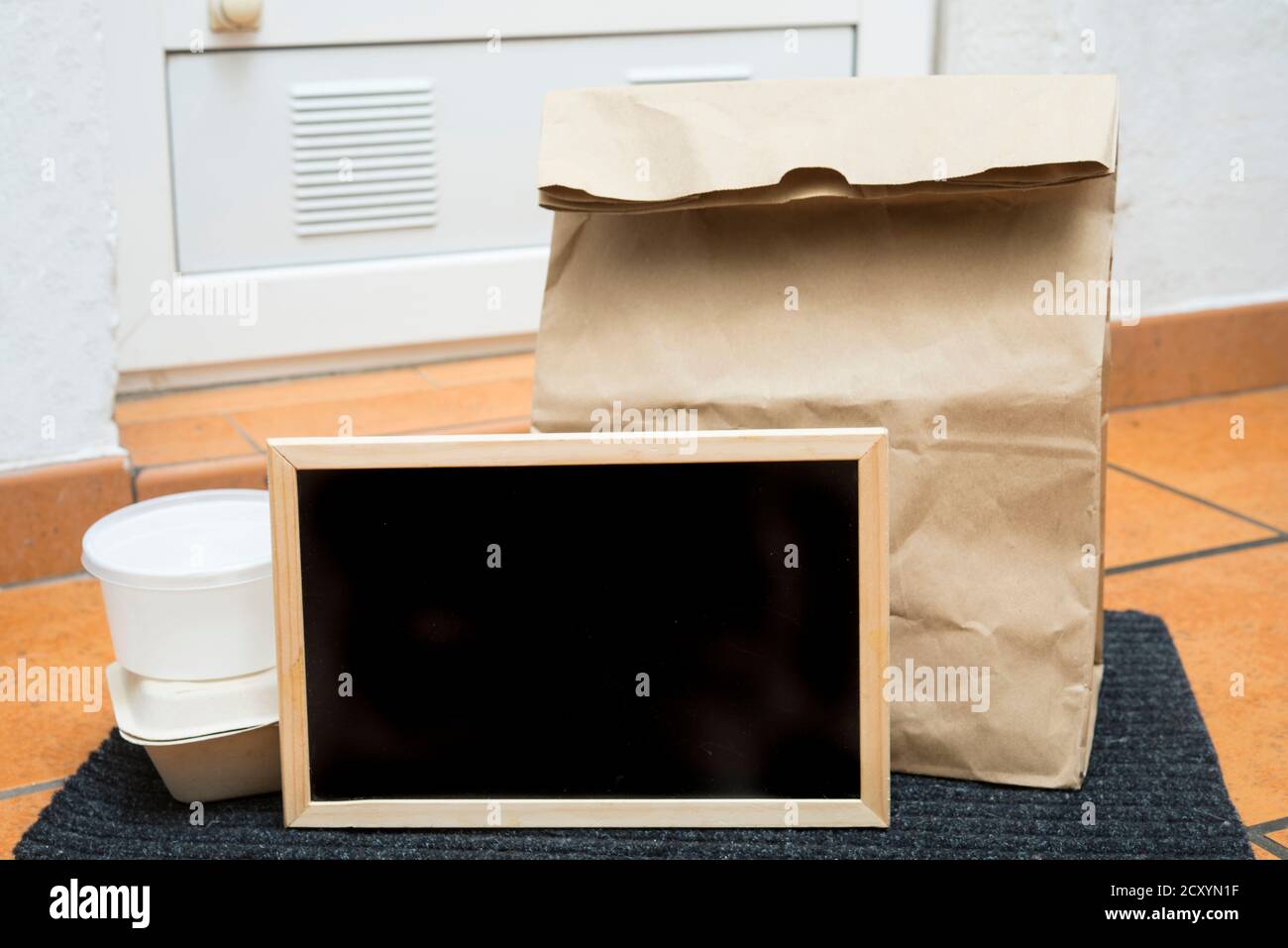 home delivery service, boxes standing by the house doors Stock Photo ...