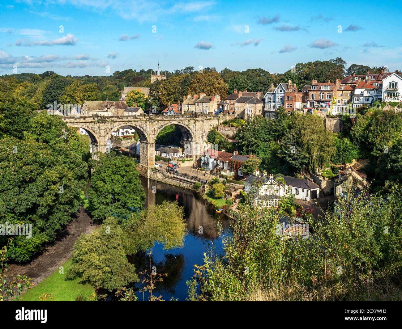 The Victorian railway viaduct across the River Nidd in early autumn ...