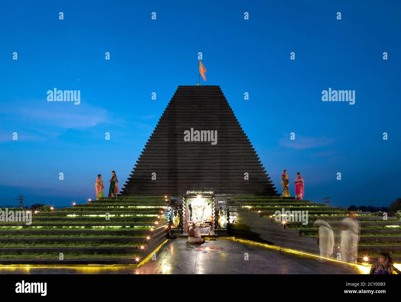 Figures on steps at dusk. Balaji Temple, Andhra Pradesh, India ...