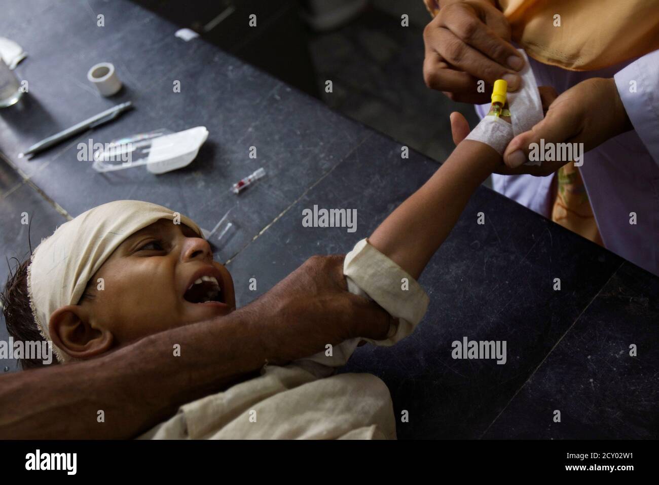 Asia boy injection hi-res stock photography and images - Alamy