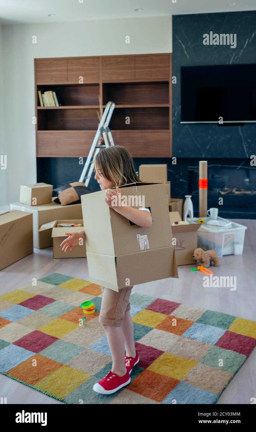 child playing with moving box Stock Photo - Alamy