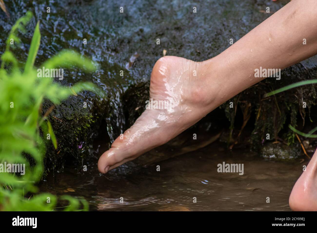 Child foot water foot hi-res stock photography and images - Alamy